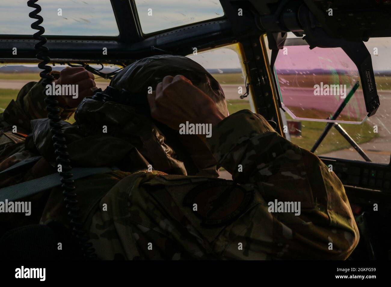 1st Lt. James Wishart, 40th Airlift Squadron co-pilot, dawns an aircrew ...