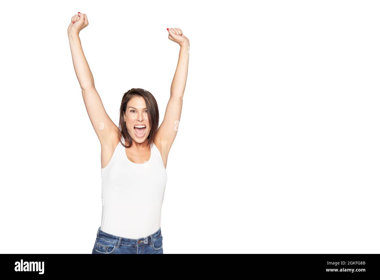Winning girl celebrating success isolated on white background. Dressed ...