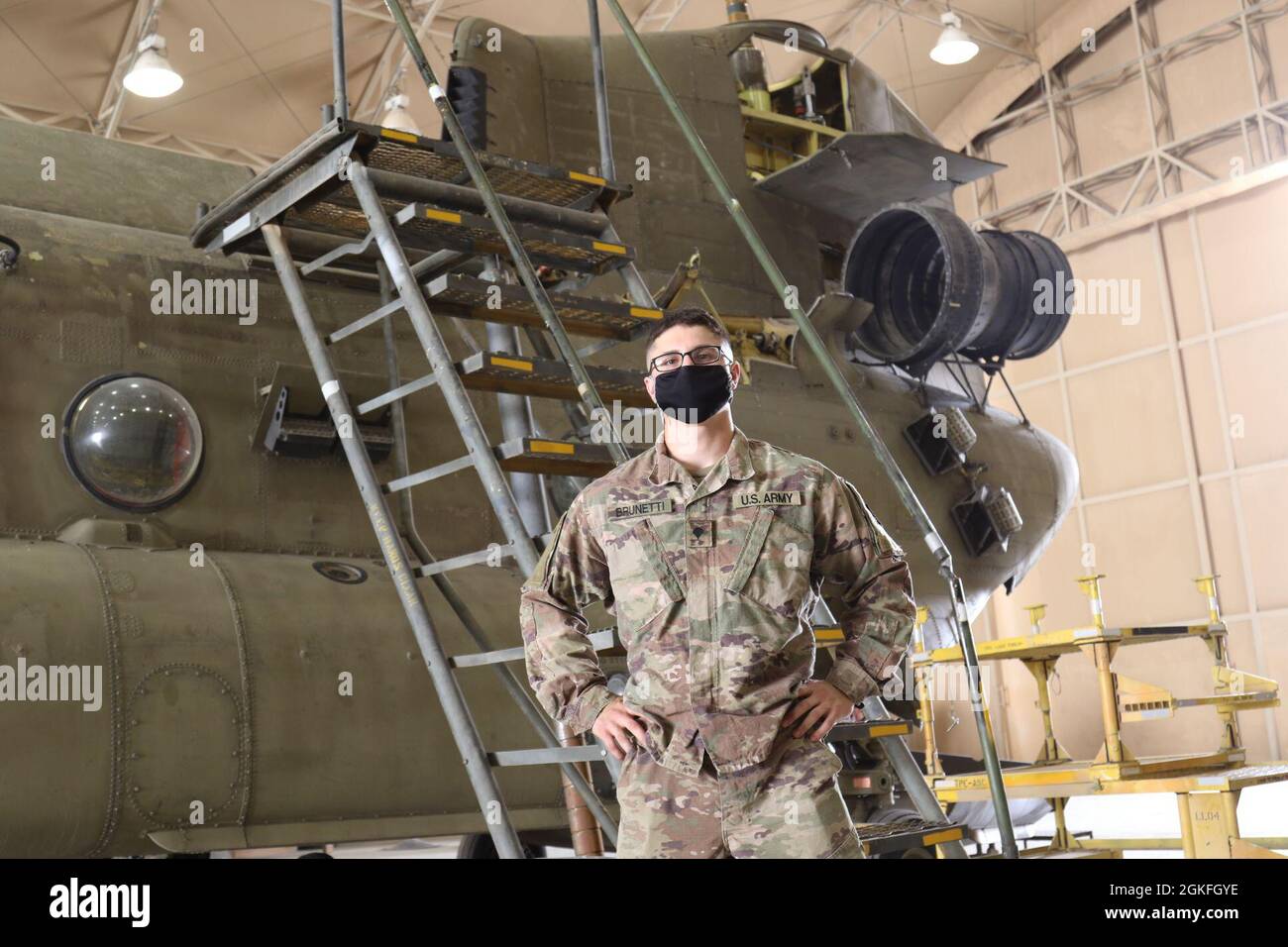 U.S. Army Spc. Angelo Brunetti, a UH-60 helicopter repairer currently ...