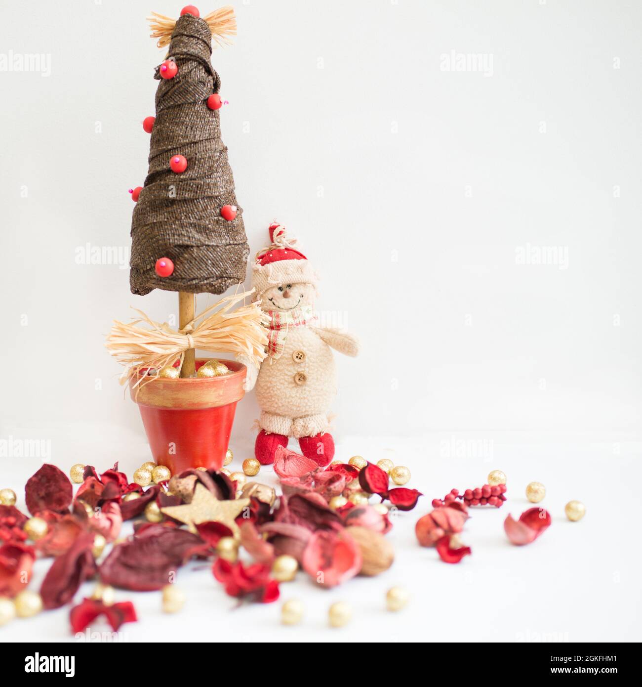 Christmas tree, snowman and red potpourri with white background Stock ...
