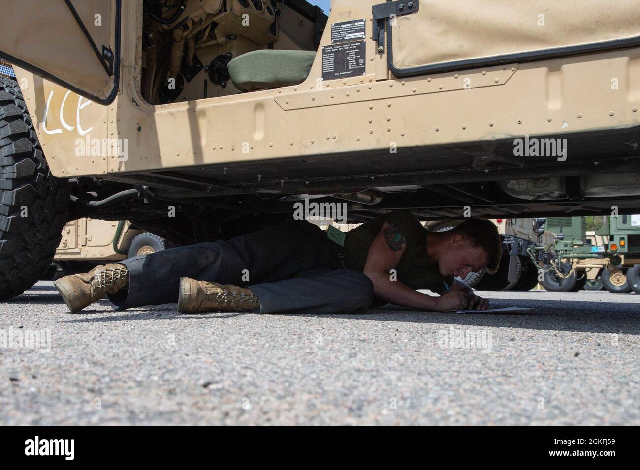 U.S. Marine Corps Pfc. Lane Seidl, an automotive maintenance technician ...