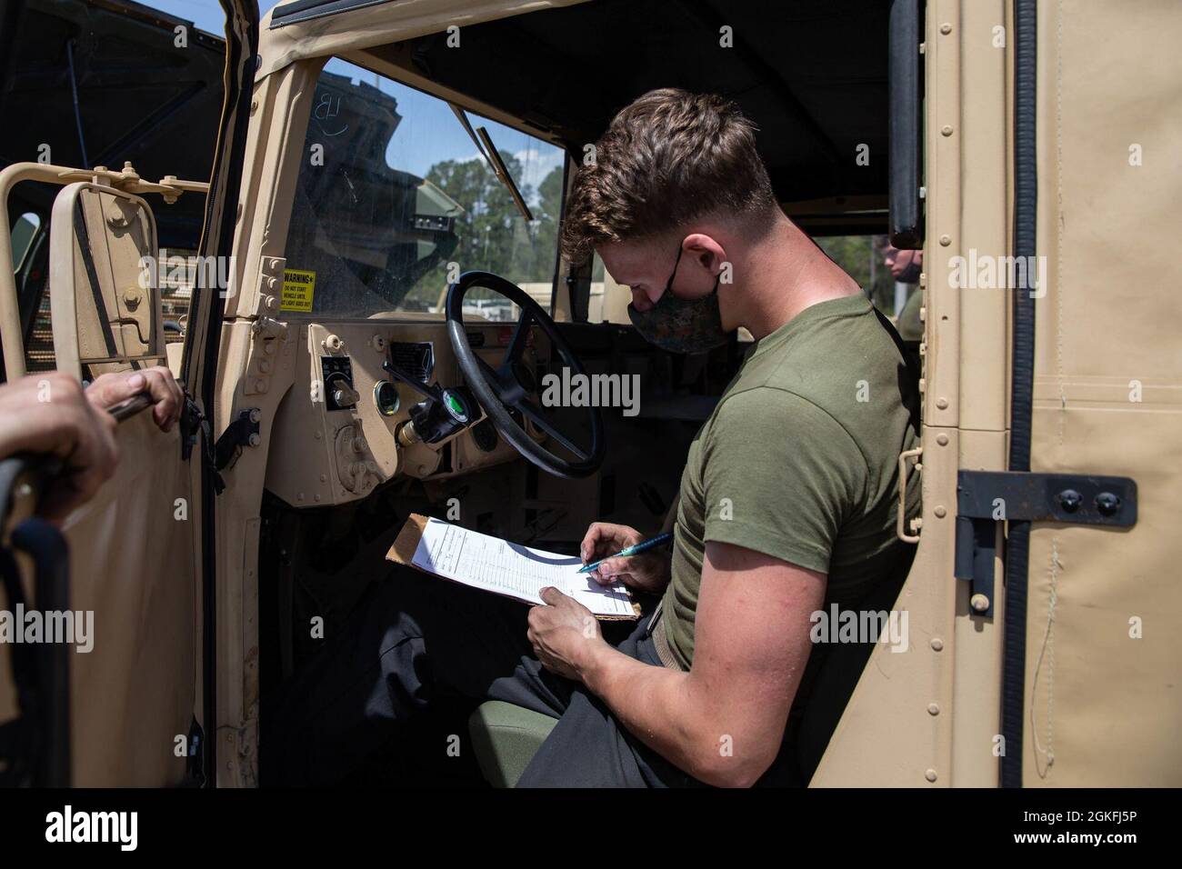 U.S. Marine Corps Pfc. Lane Seidl, an automotive maintenance technician ...