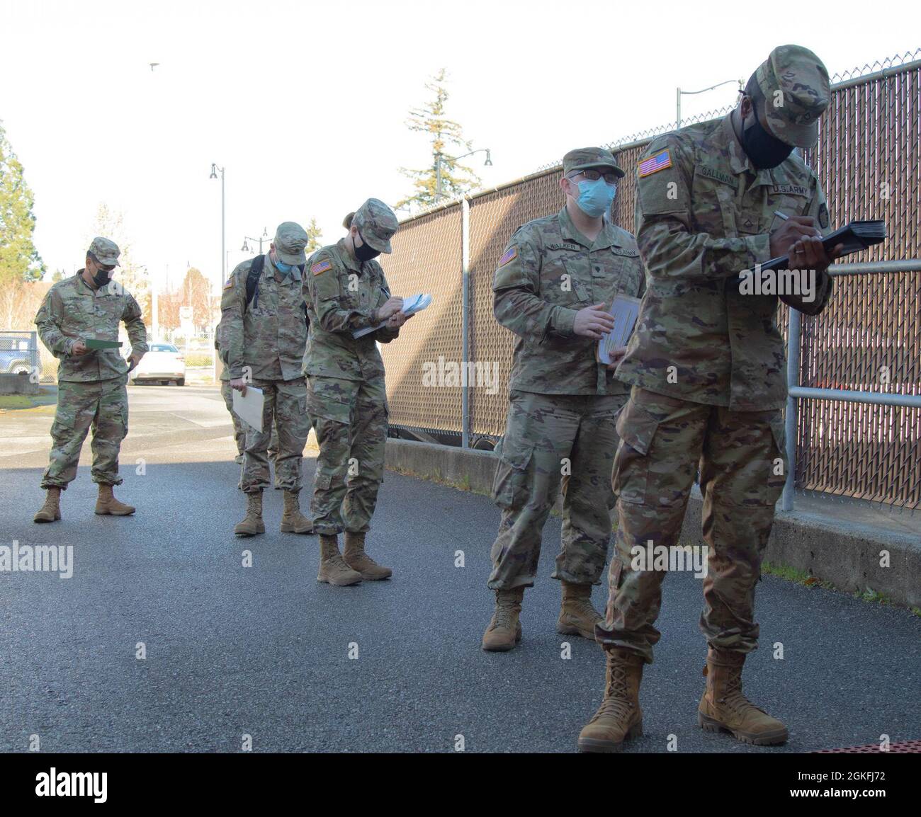 Soldiers from the 110th Chemical Battalion check and update their ...