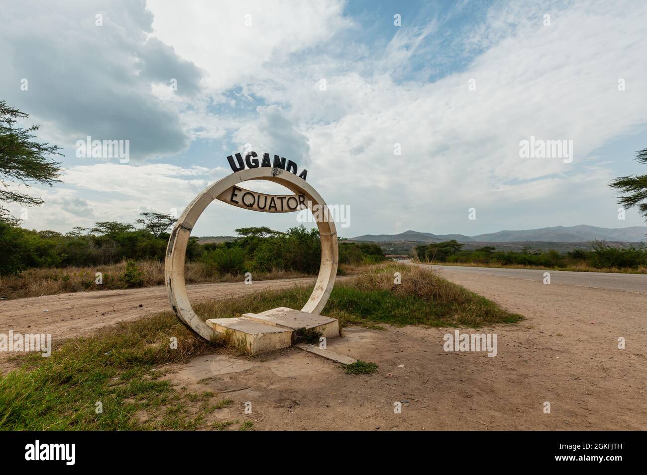 Equator crossing sign monument in Uganda Stock Photo - Alamy