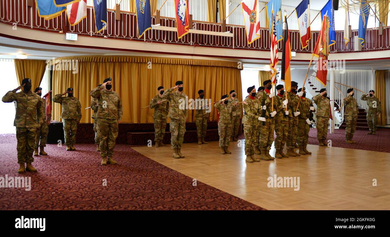 U.S. Soldiers with the 39th Transportation Battalion render honors as ...