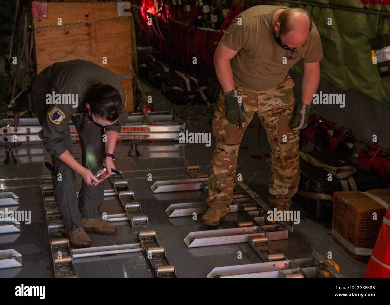 U.S. Air Force Senior Airman Ashley Upton (left), a 50th Air Refueling ...