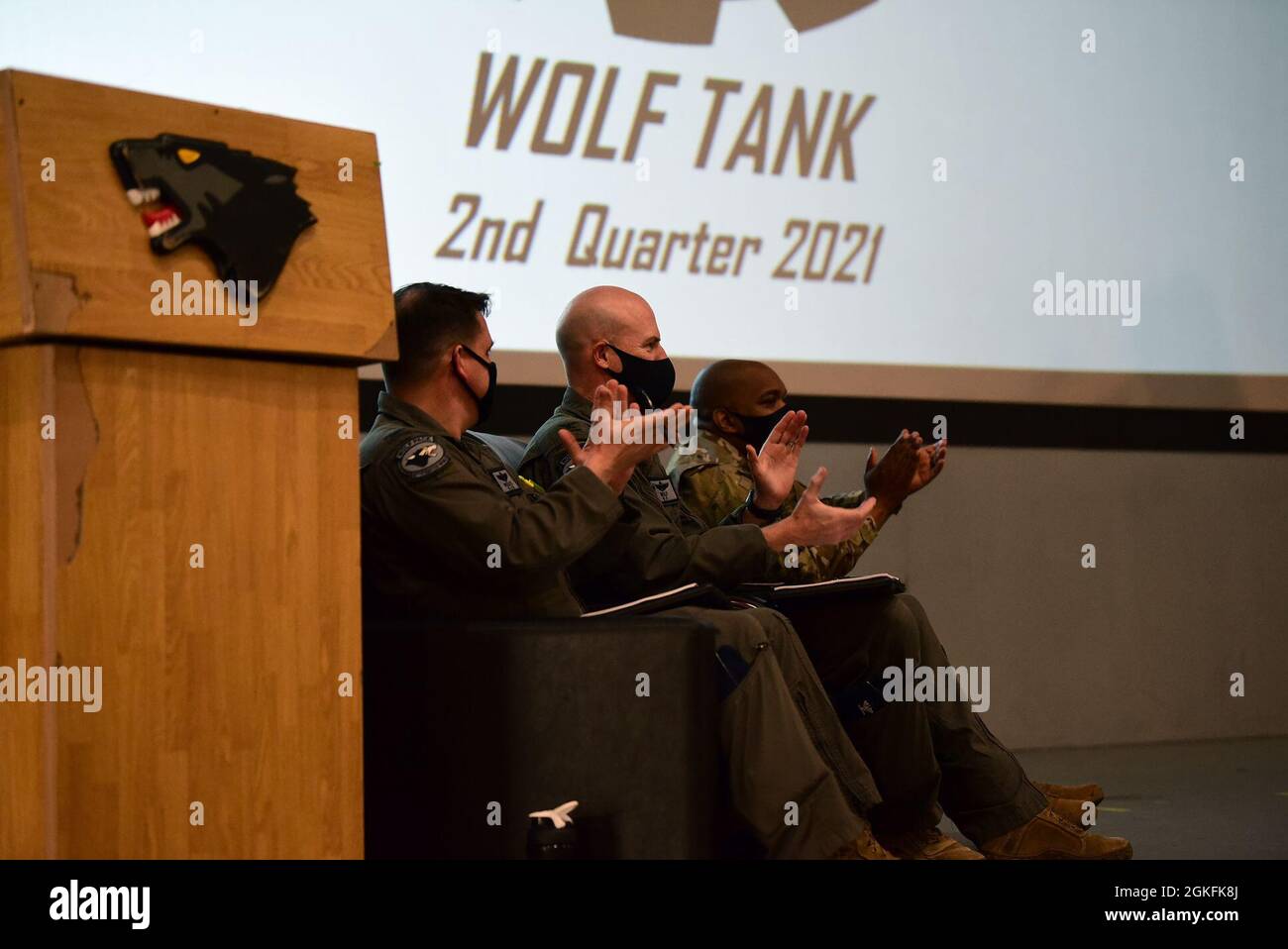 Wing leadership clap during a Wolf Tank introduction at Kunsan Air Base ...