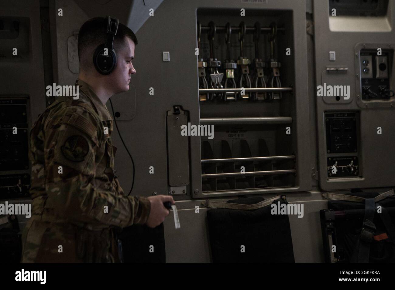 U.S. Air Force Airman 1st Class Michael McDougall, loadmaster for the ...