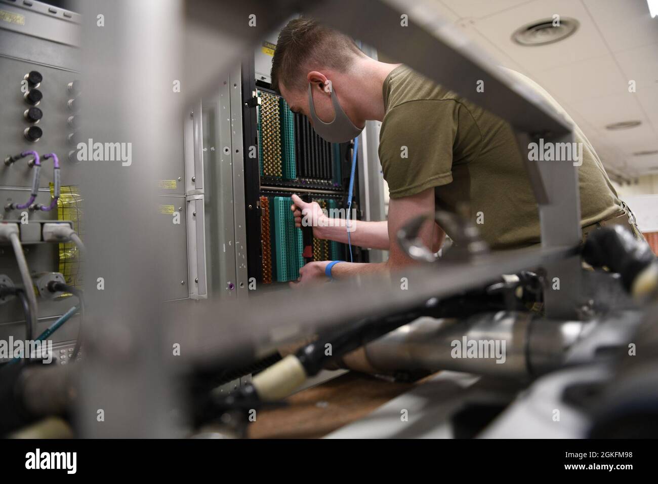 A U.S. Air Force avionics technician from the 18th Component ...