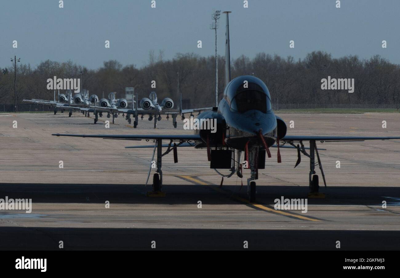 A-10 Thunderbolt IIs with the 442d Fighter Wing taxi down the flight ...