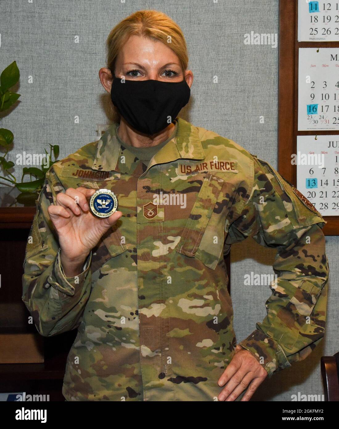 Master Sgt. Lynn Johnson, 117th Force Support Squadron, poses with a ...