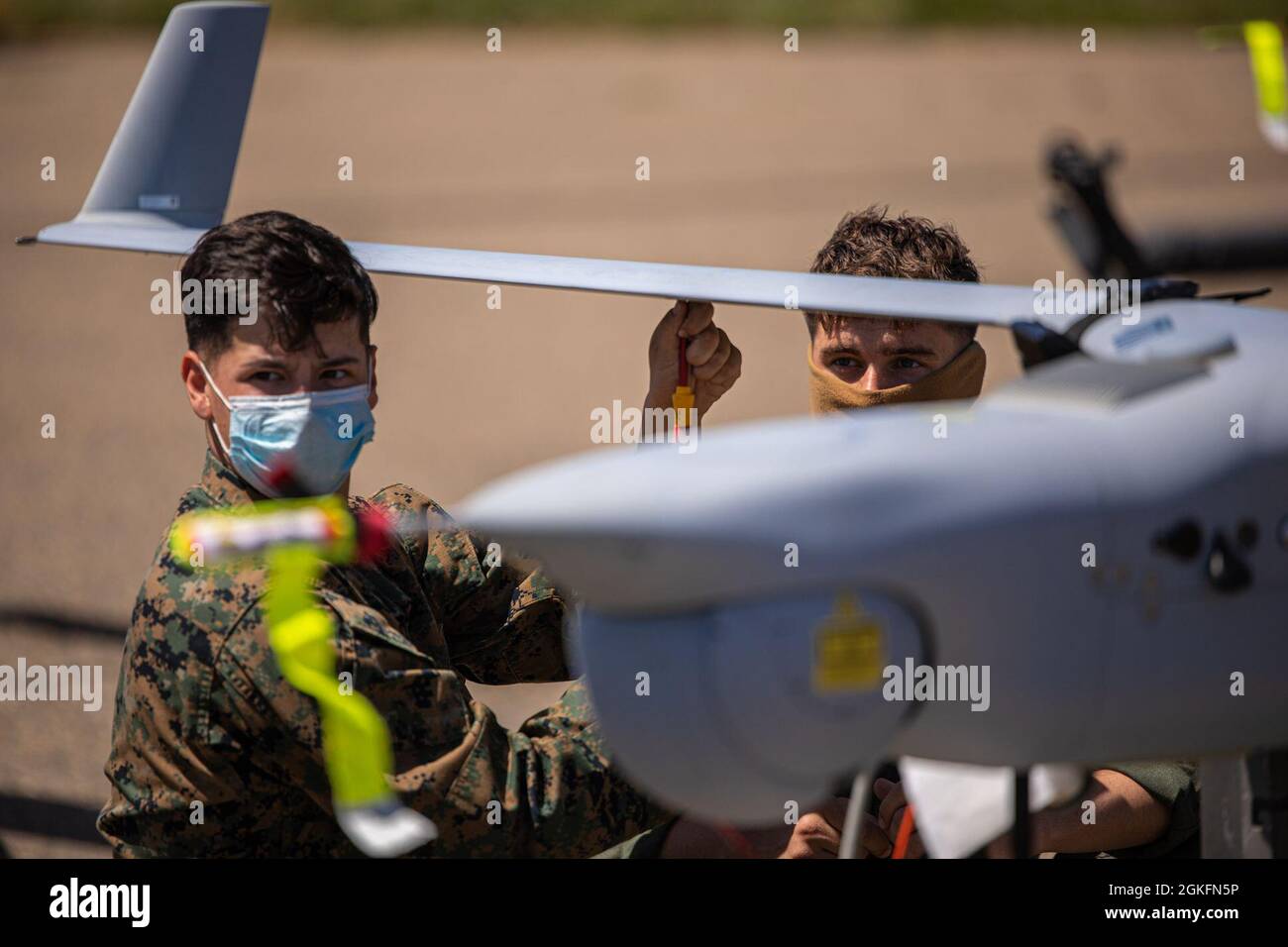 Marines with Marine Unmanned Aerial Vehicle Squadron 4 (VMU-4), perform ...