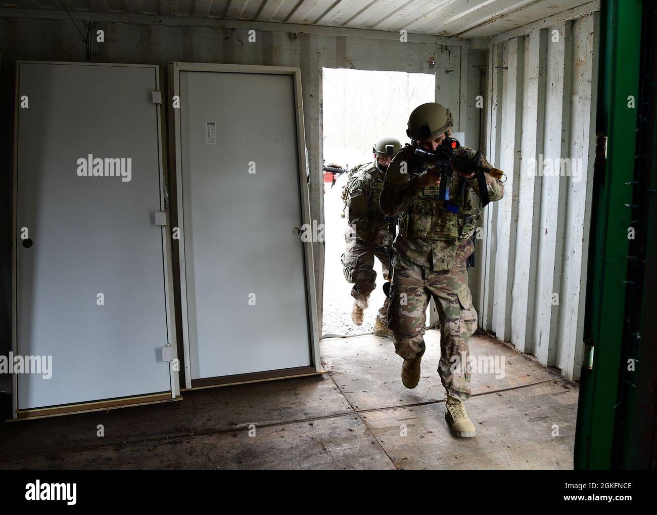 Airmen with the 105th Base Defense squadron conduct close quarters ...