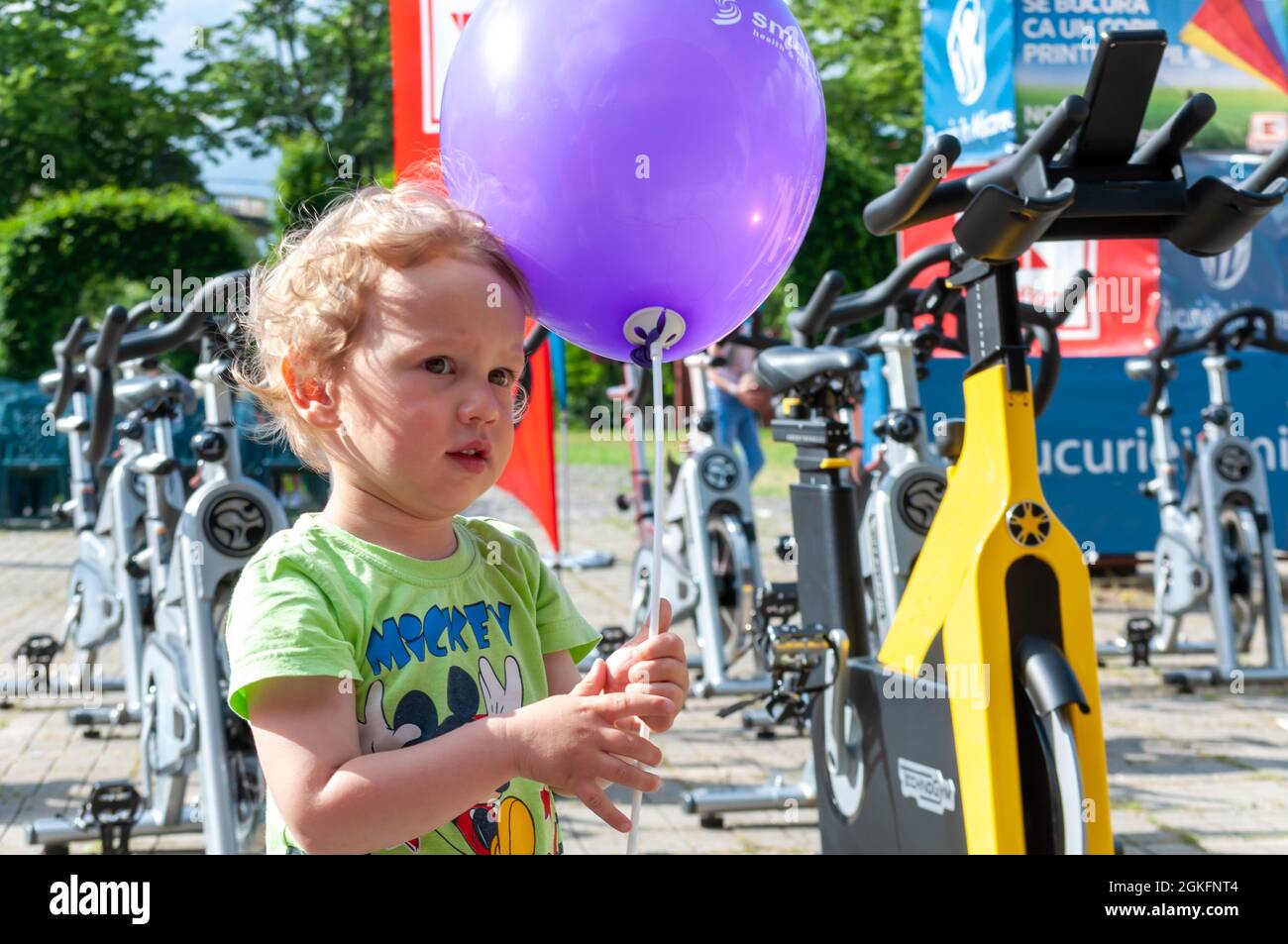 Timisoara, Romania - May 26, 2017: Kid playing with a baloon at a ...