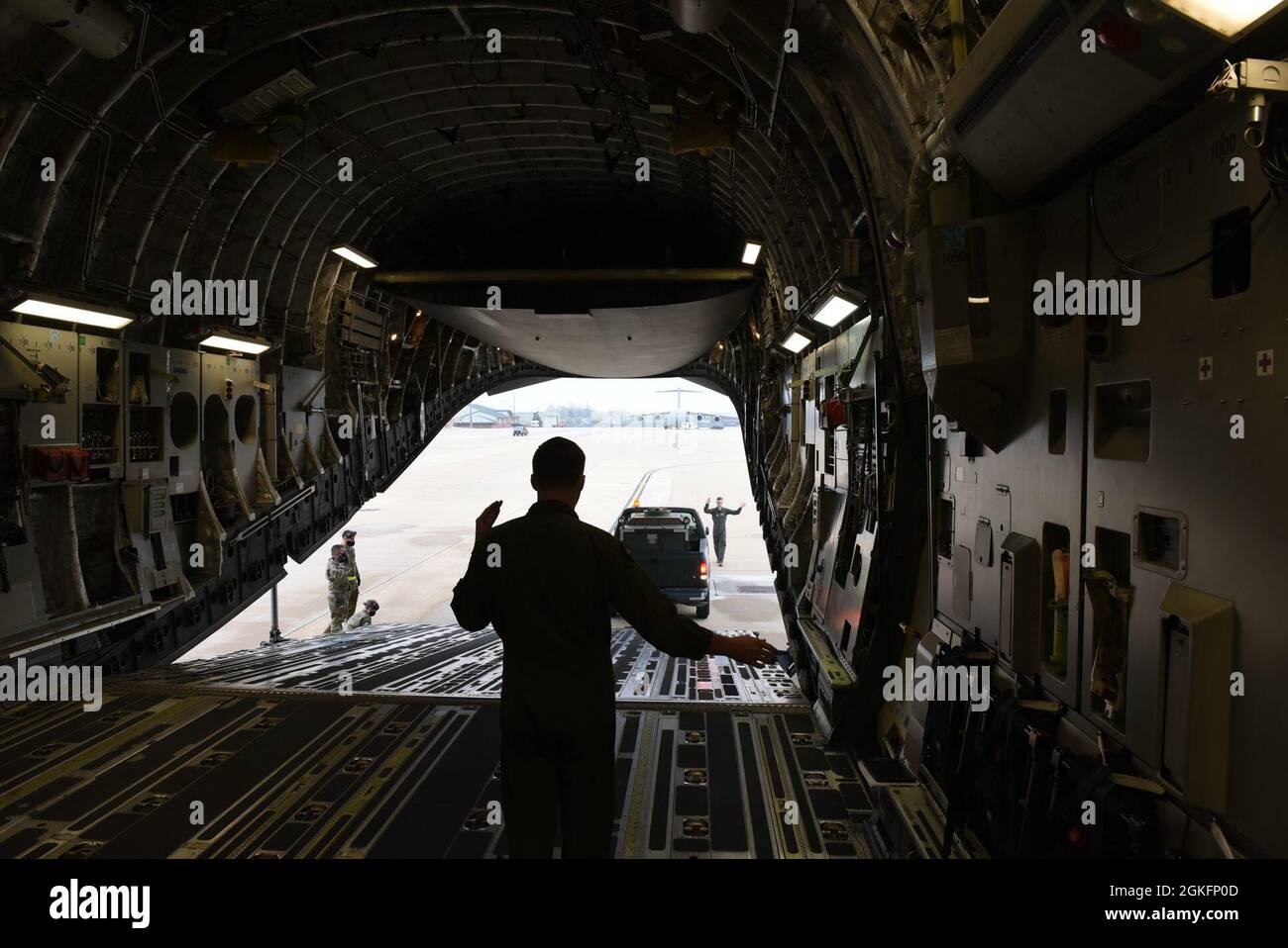 U.S. Air Force Staff Sgt. Connor Collins, a loadmaster with the 167th ...