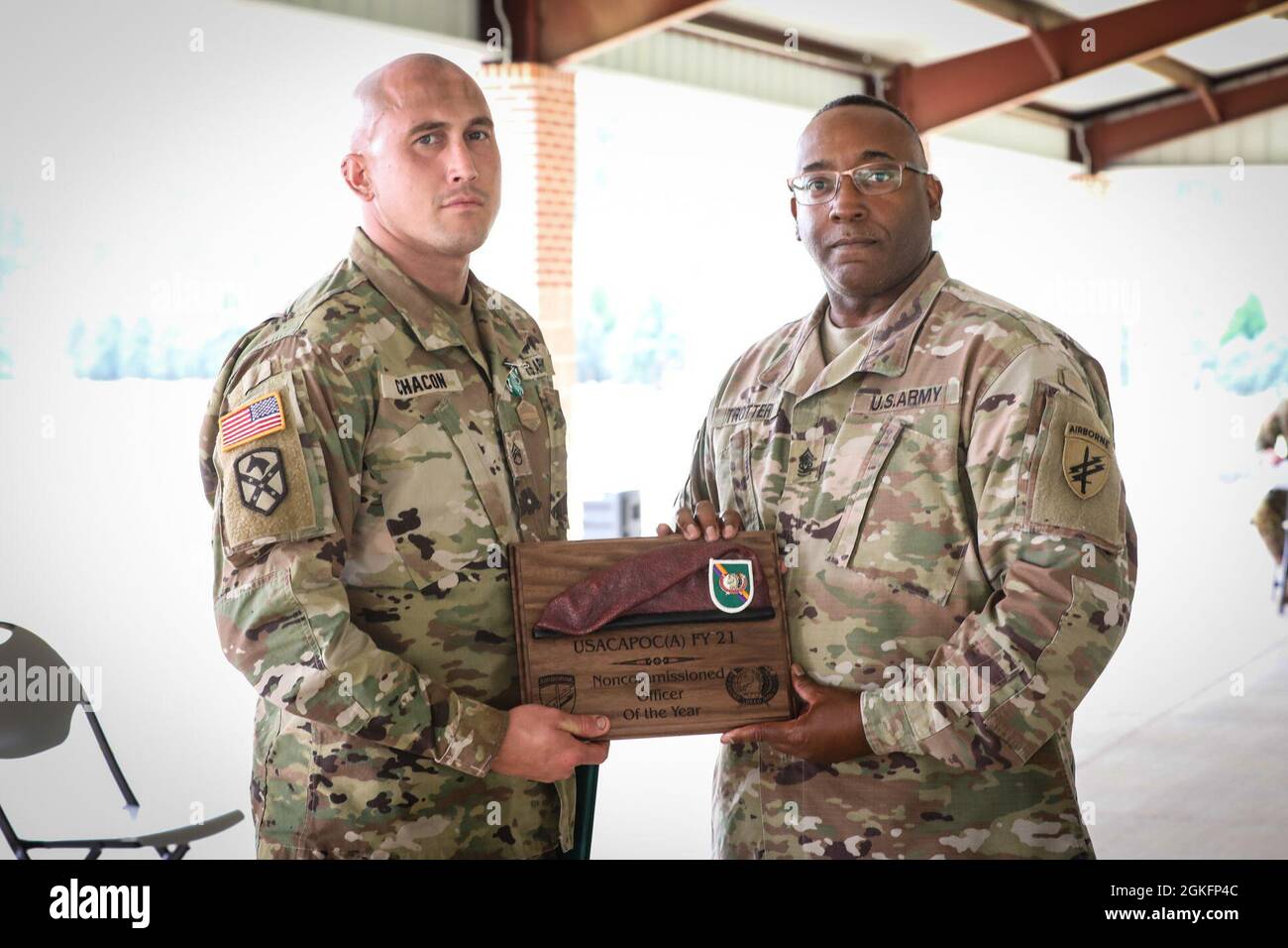 Staff Sgt. Jonathan Chacon, left, a civil affairs specialist with the ...