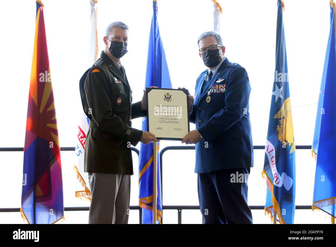 Chief of the National Guard Bureau, General Daniel R. Hokanson presents ...