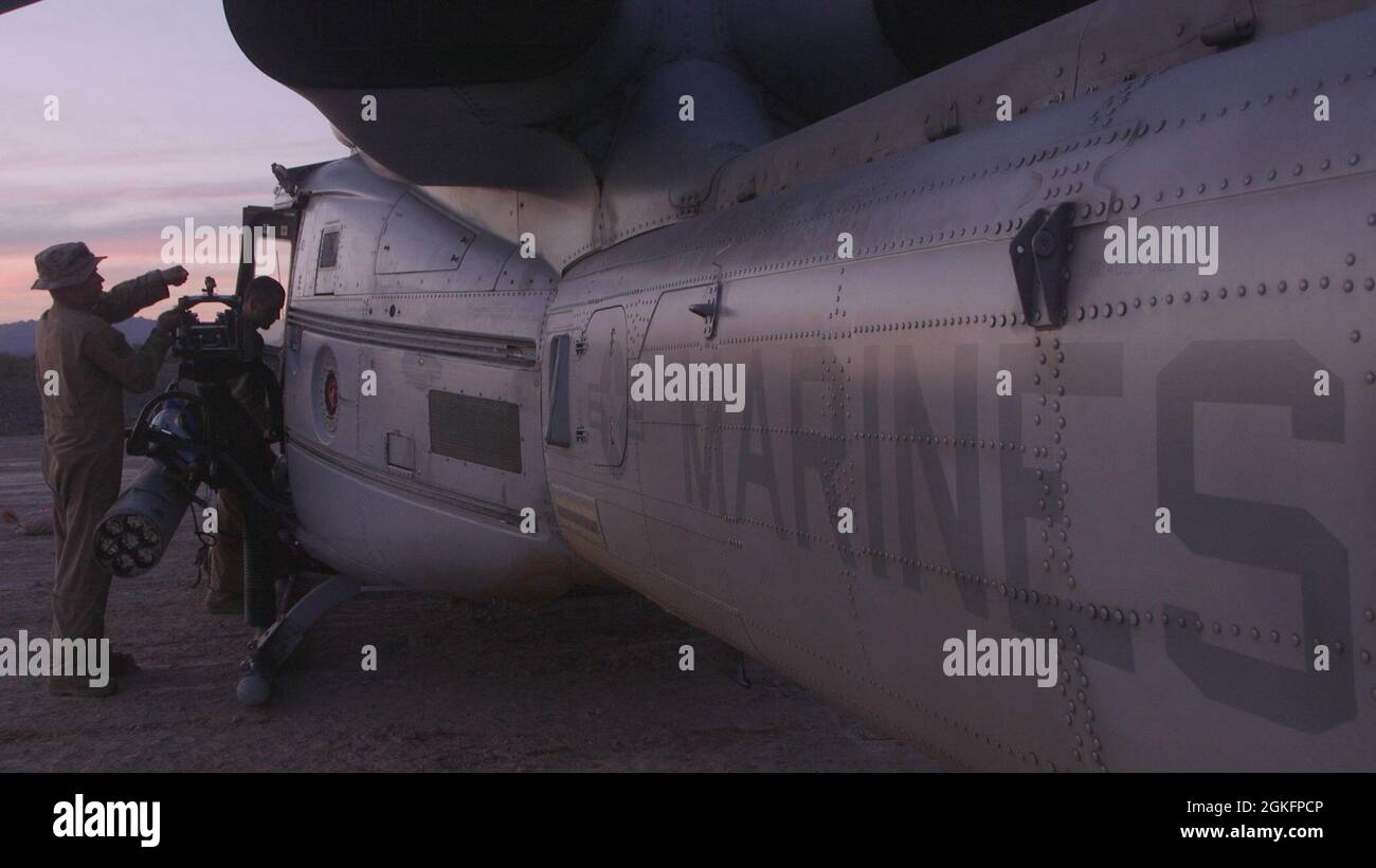 U.S. Marine Corps Staff Sgt. Ryan Kidd, a crew chief instructor, with ...