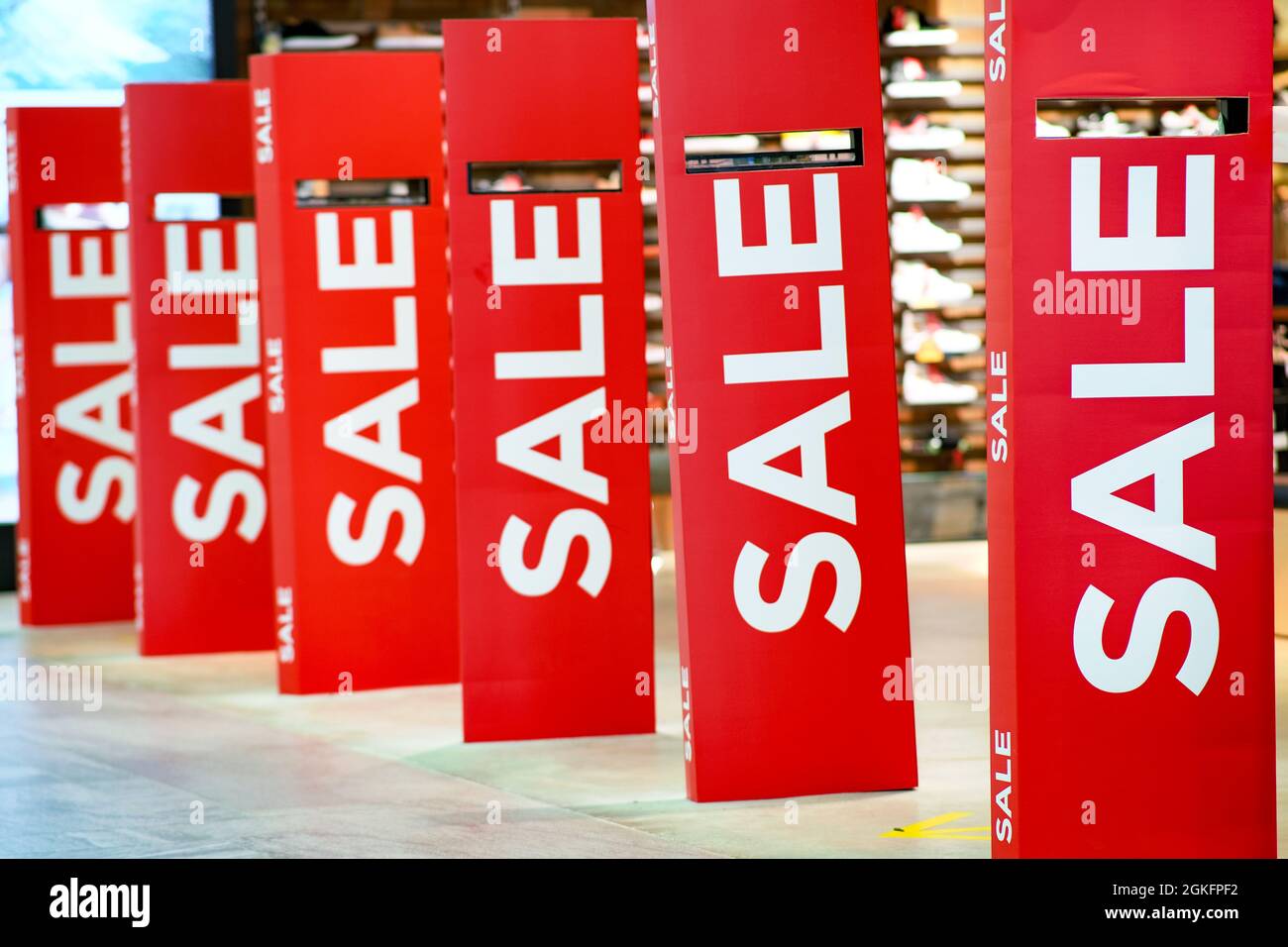 Sale of purchases on a red background. Inviting marketing advertising ...