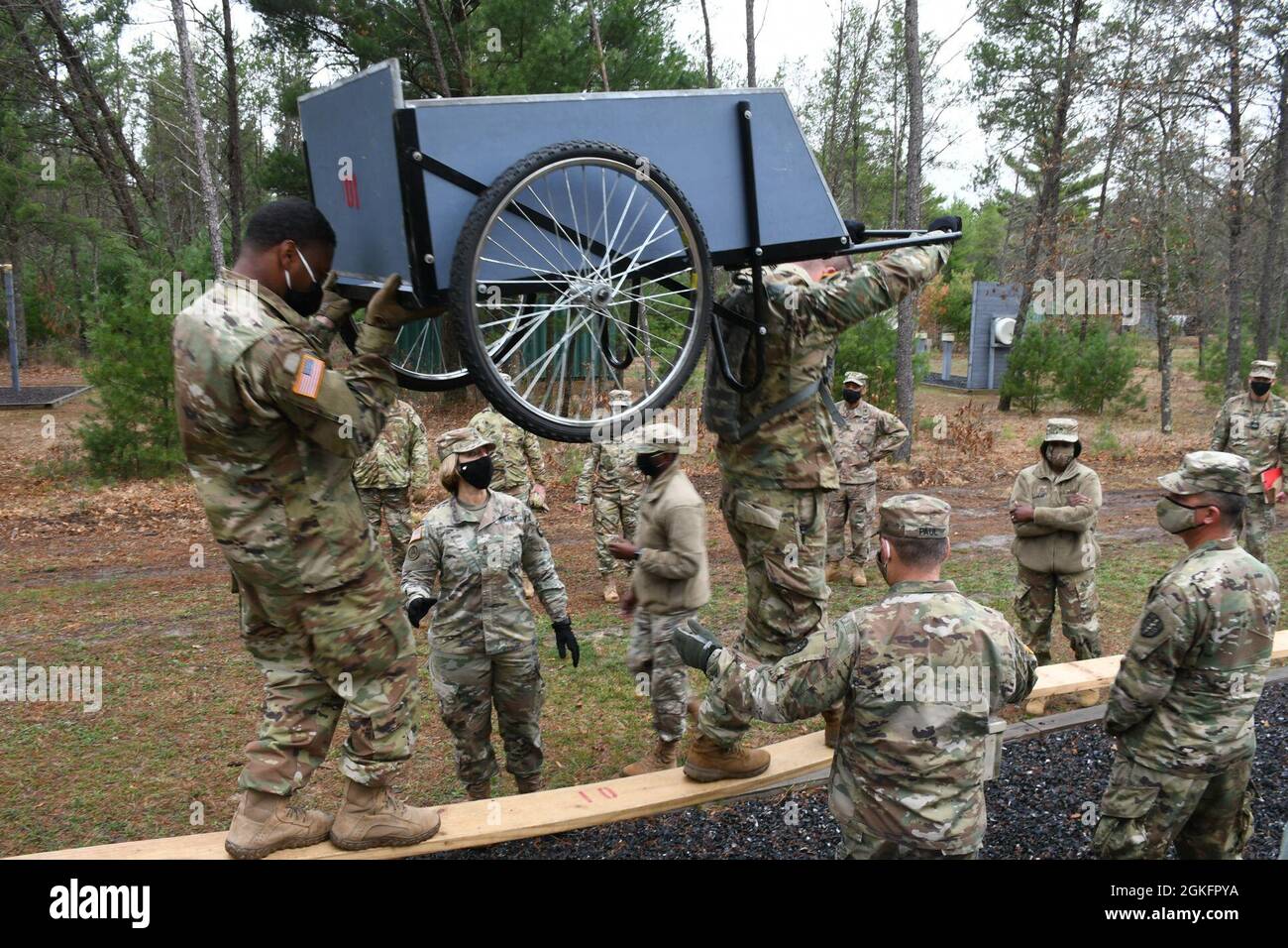 Soldiers demonstrate teamwork on the Leadership Reaction Course during ...