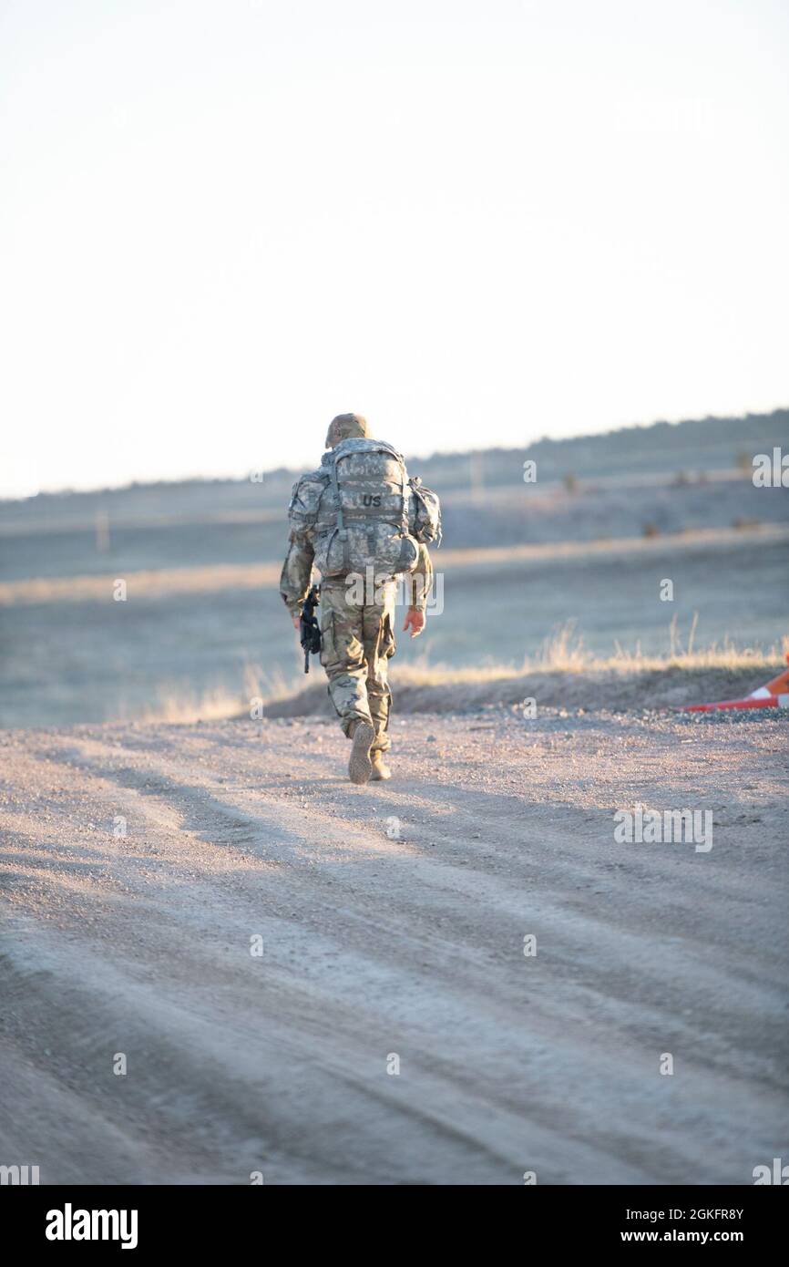 Spc. Aiden Carroll in the midst of the 6.2 mile ruck march for the Best ...