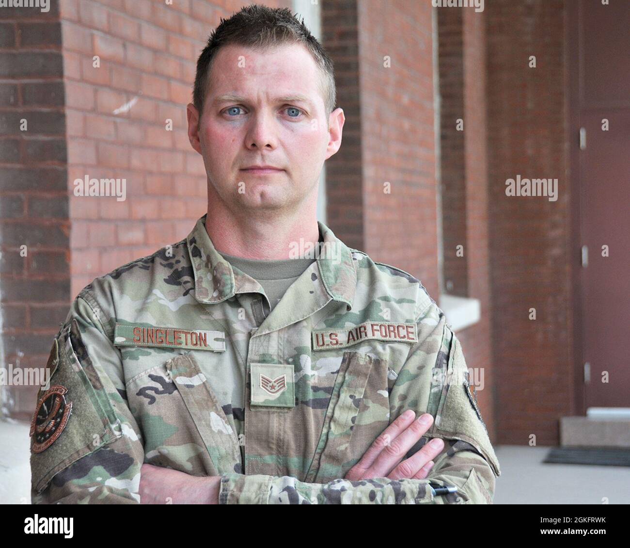 Staff Sgt. Scott Singleton poses outside the 157th Air Operations Group ...