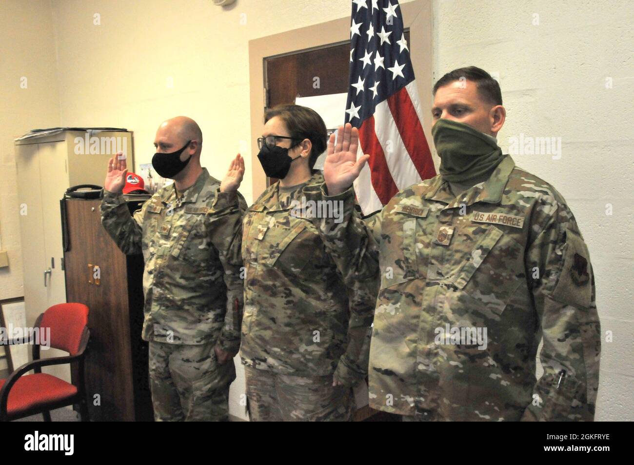 Seven members of the 111th Attack Wing recite the "Oath of Enlistment ...