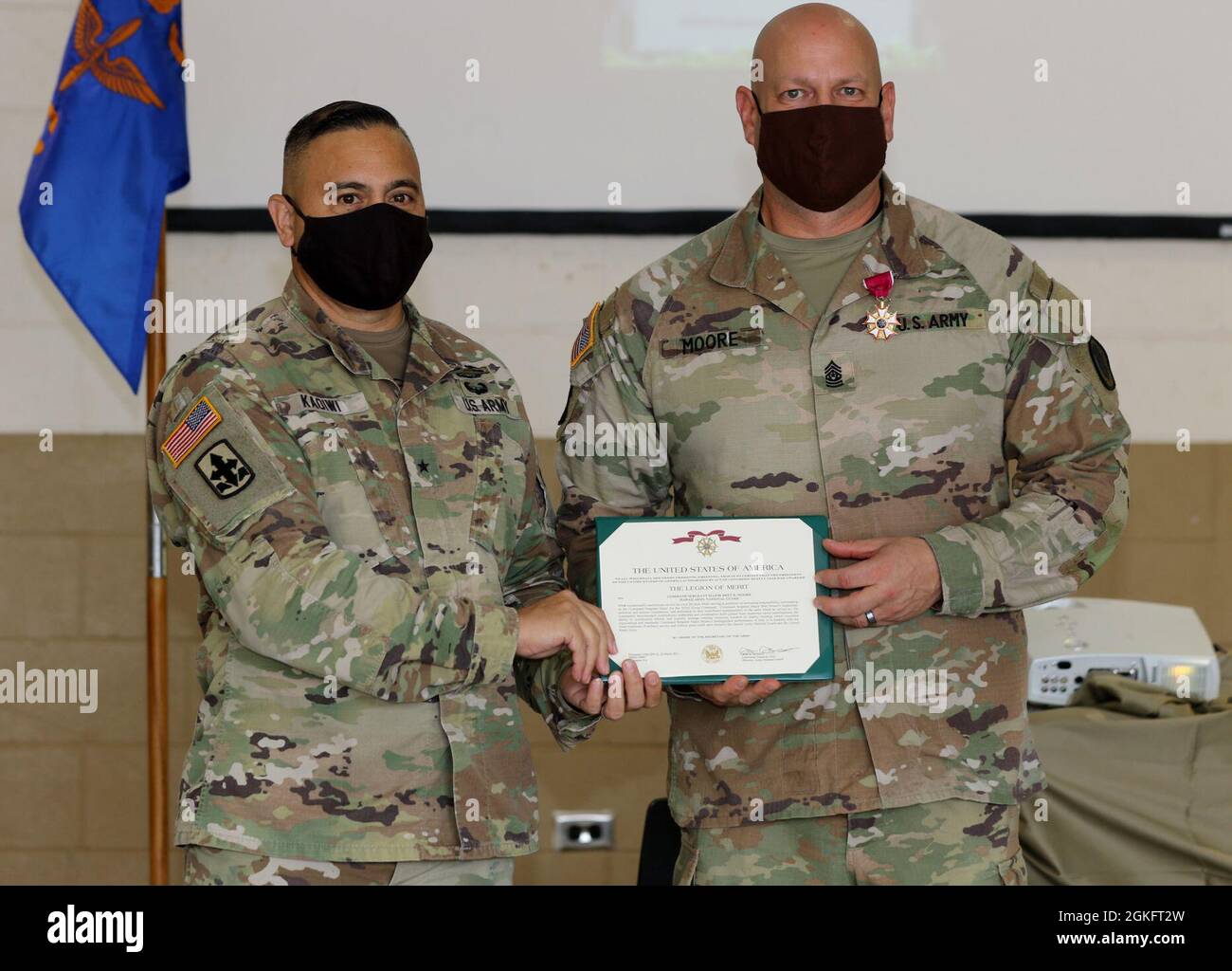 Hawaii Army National Guard Brig. Gen. Moses Kaoiwi Jr. presents the U.S ...