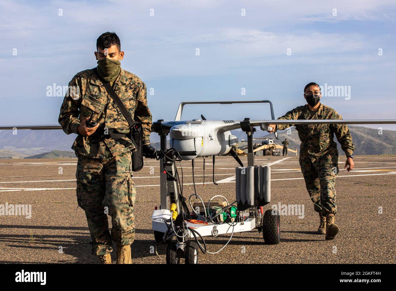 Marines with Marine Unmanned Aerial Vehicle Squadron 4 (VMU-4) recover ...