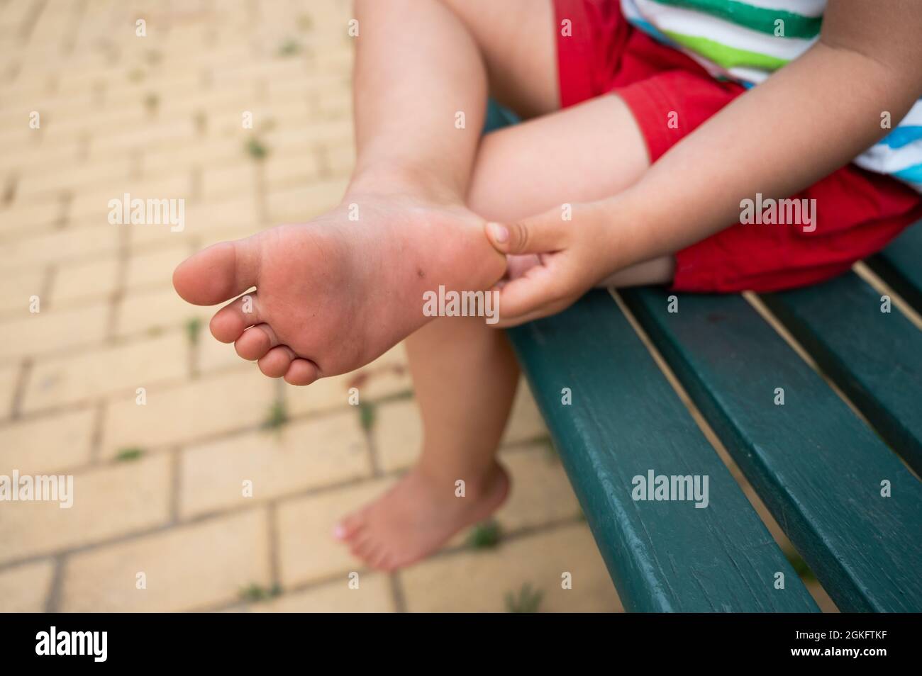 Barefoot child hurt hi-res stock photography and images - Alamy