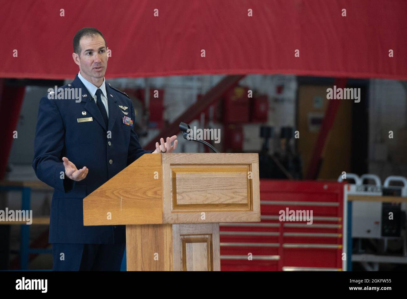 U.S. Air Force Col. Christopher Spinelli, right, receives the 932nd ...