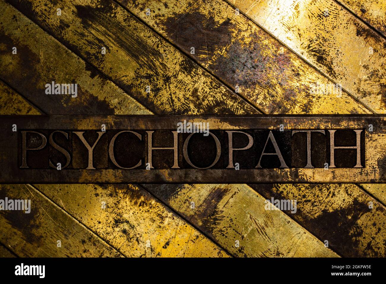 Psychopath text on vintage textured copper and gold background Stock ...