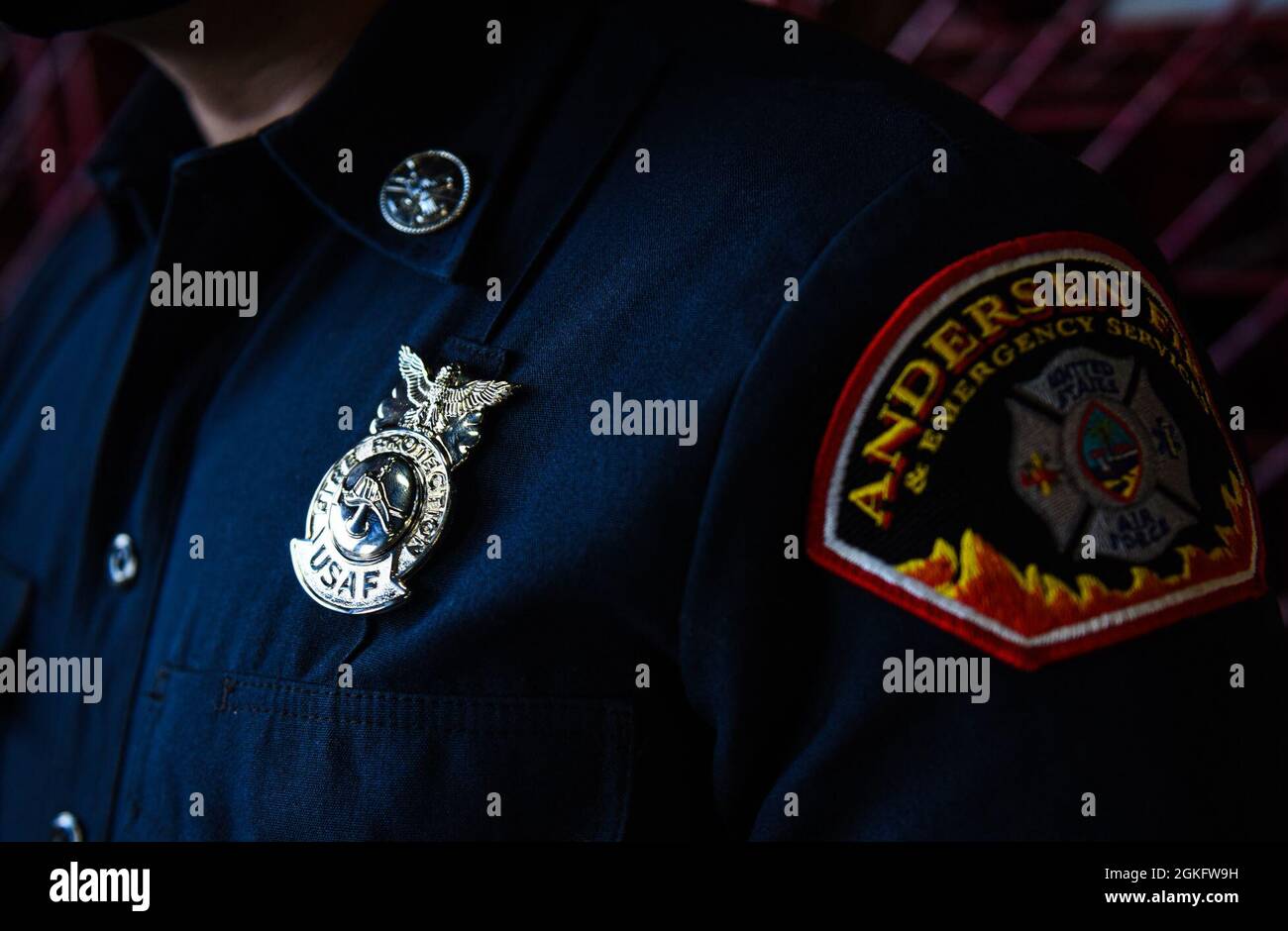 A United States Air Force Fire Protection badge is shown during a shift ...