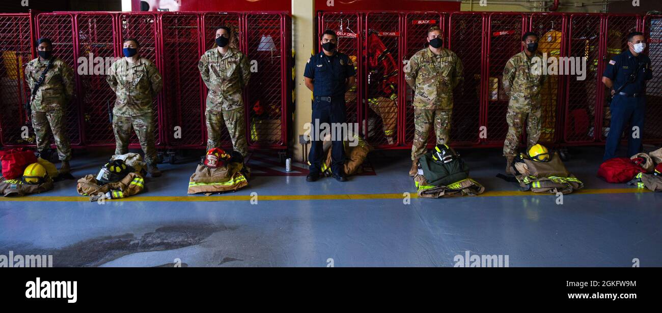United States Air Force Airmen and Firefighters assigned to the 36th ...