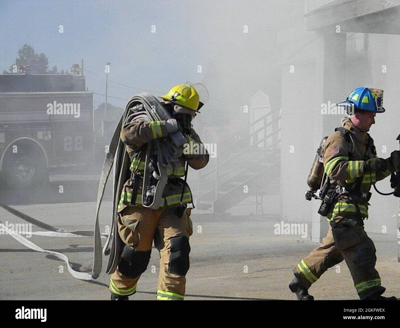 Hospital Corpsman 1st Class James Williams, left, responds to an ...