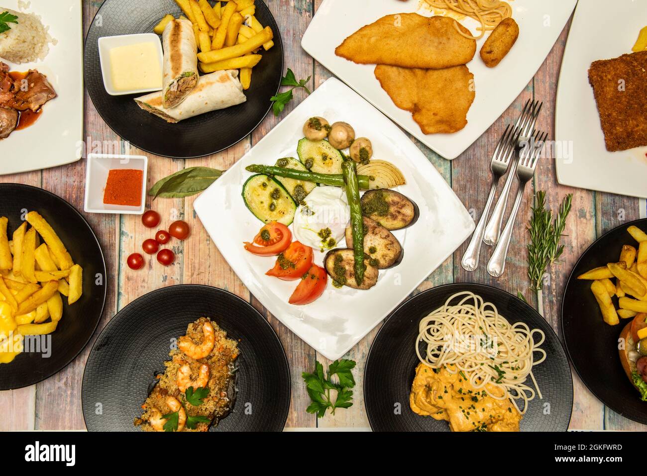 Mediterranean dishes and burritos, chicken schnitzel, shrimp rice ...
