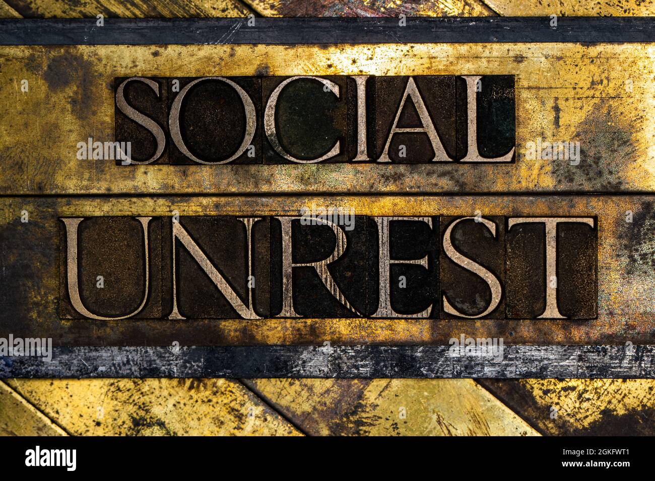 Social Unrest text on vintage textured grunge copper and gold ...