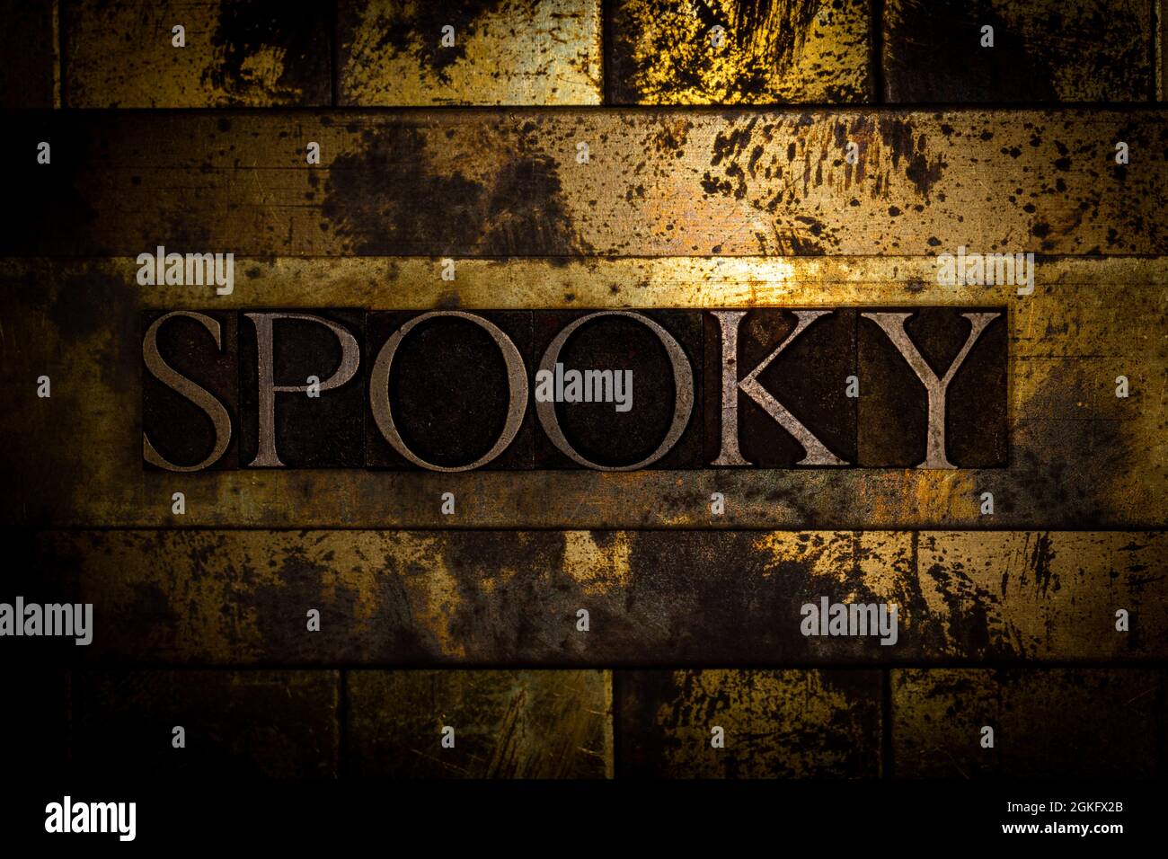 Spooky text message on textured grunge copper and vintage gold ...
