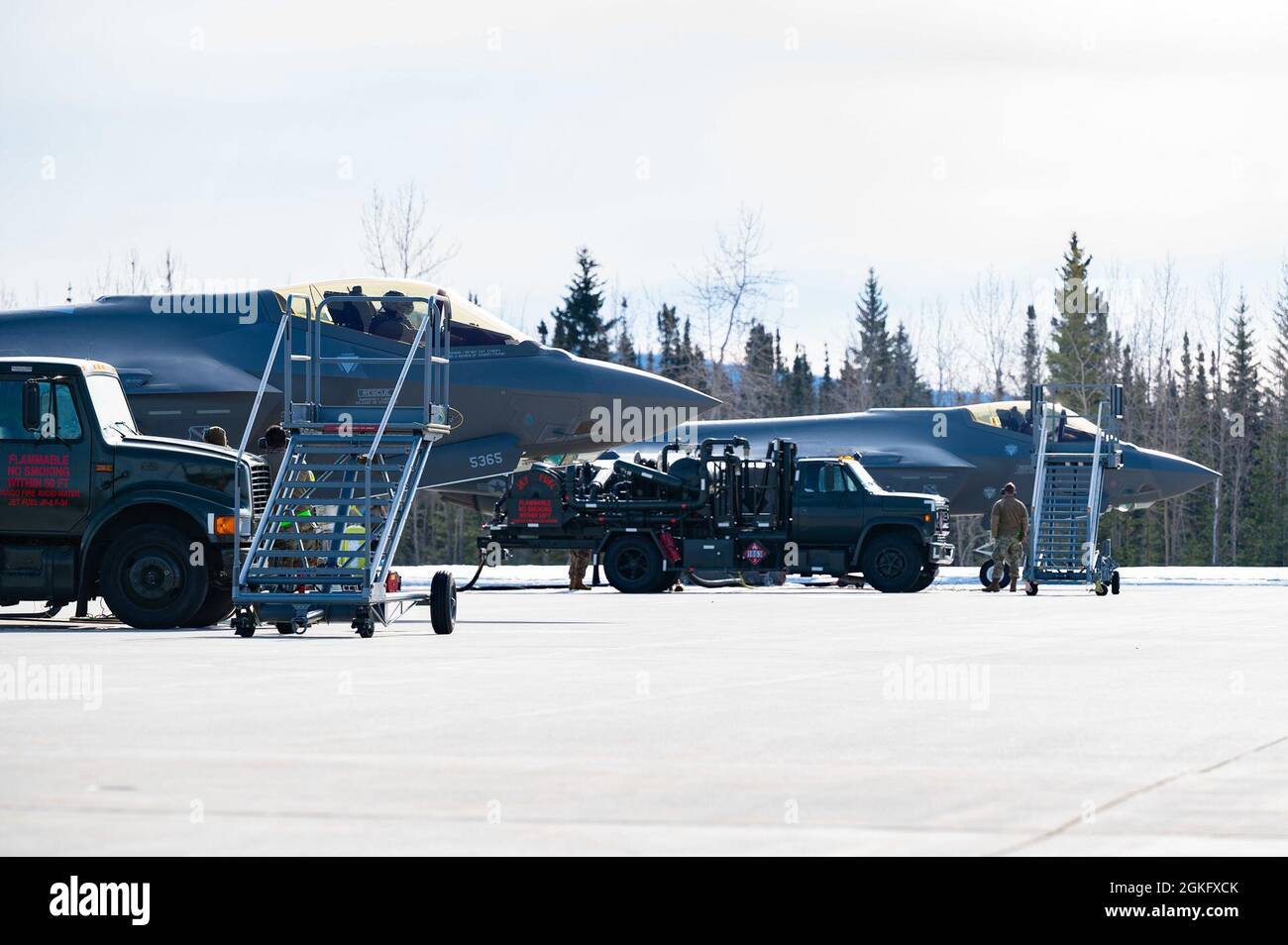 U.S. Airmen from the 354th Logistics Readiness Squadron refuel two F ...