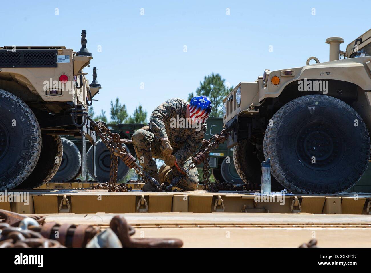U.S. Marine Corps Staff Sgt. Drew Howell, a landing support specialist ...