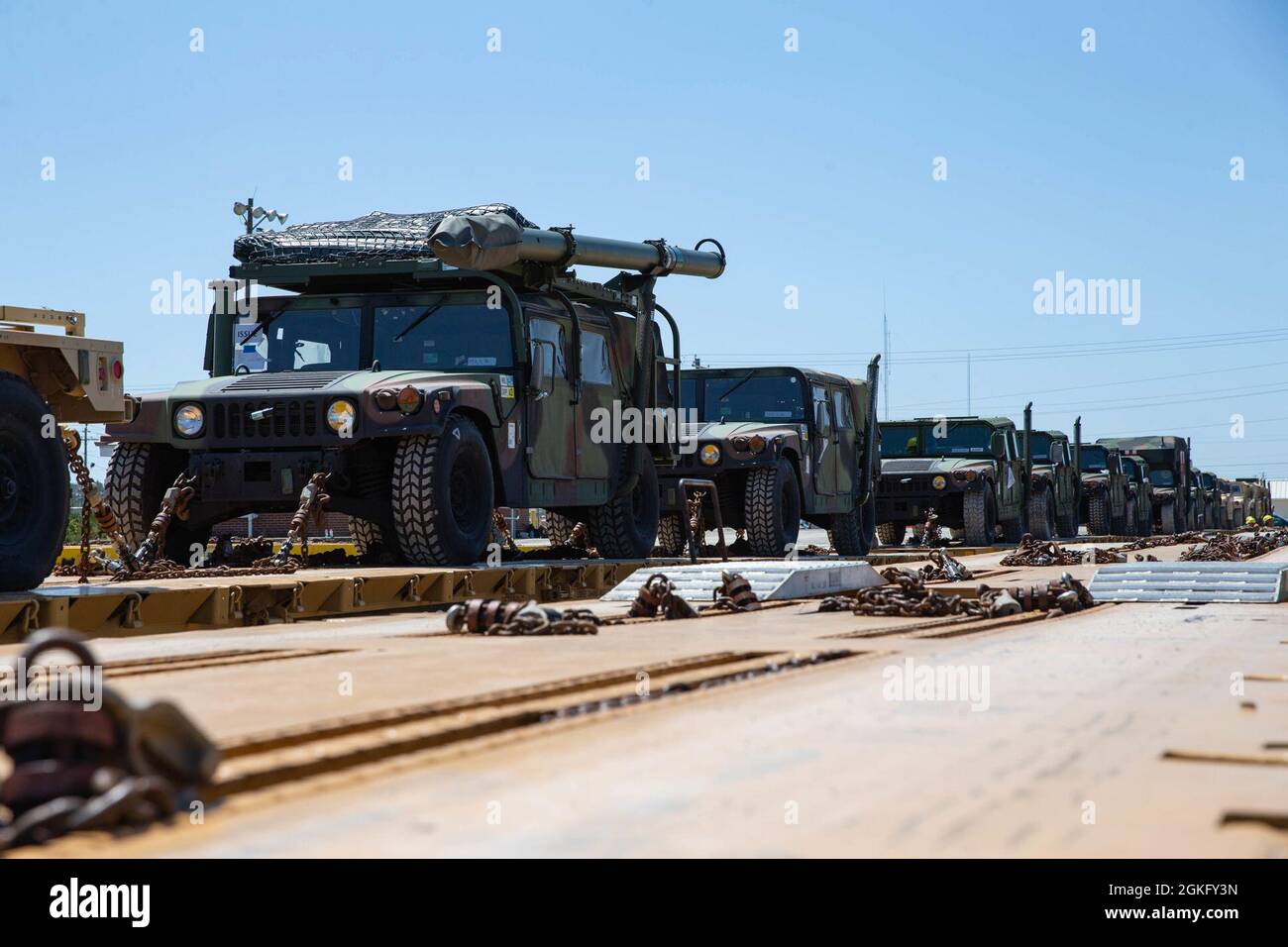 U.S. Marines stage tactical vehicles on rail cars during exercise ...