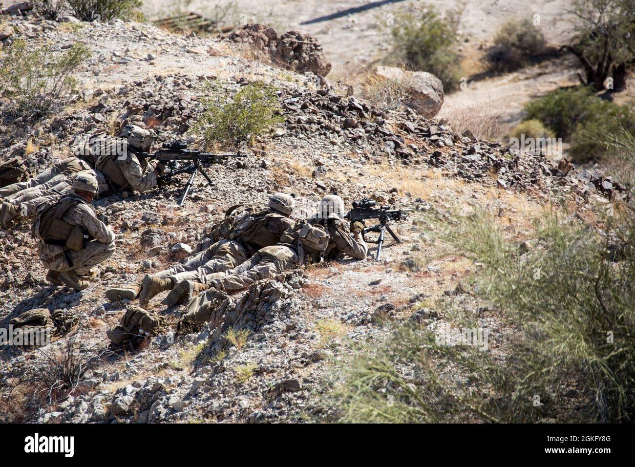 U.S. Marine Corps machine gunners with 2nd Battalion, 4th Marine ...