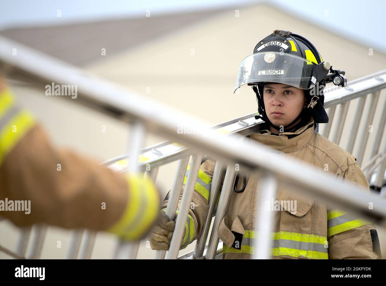 Linda Busch-Mendez, Cibolo Fire Department firefighter, holds a ladder ...