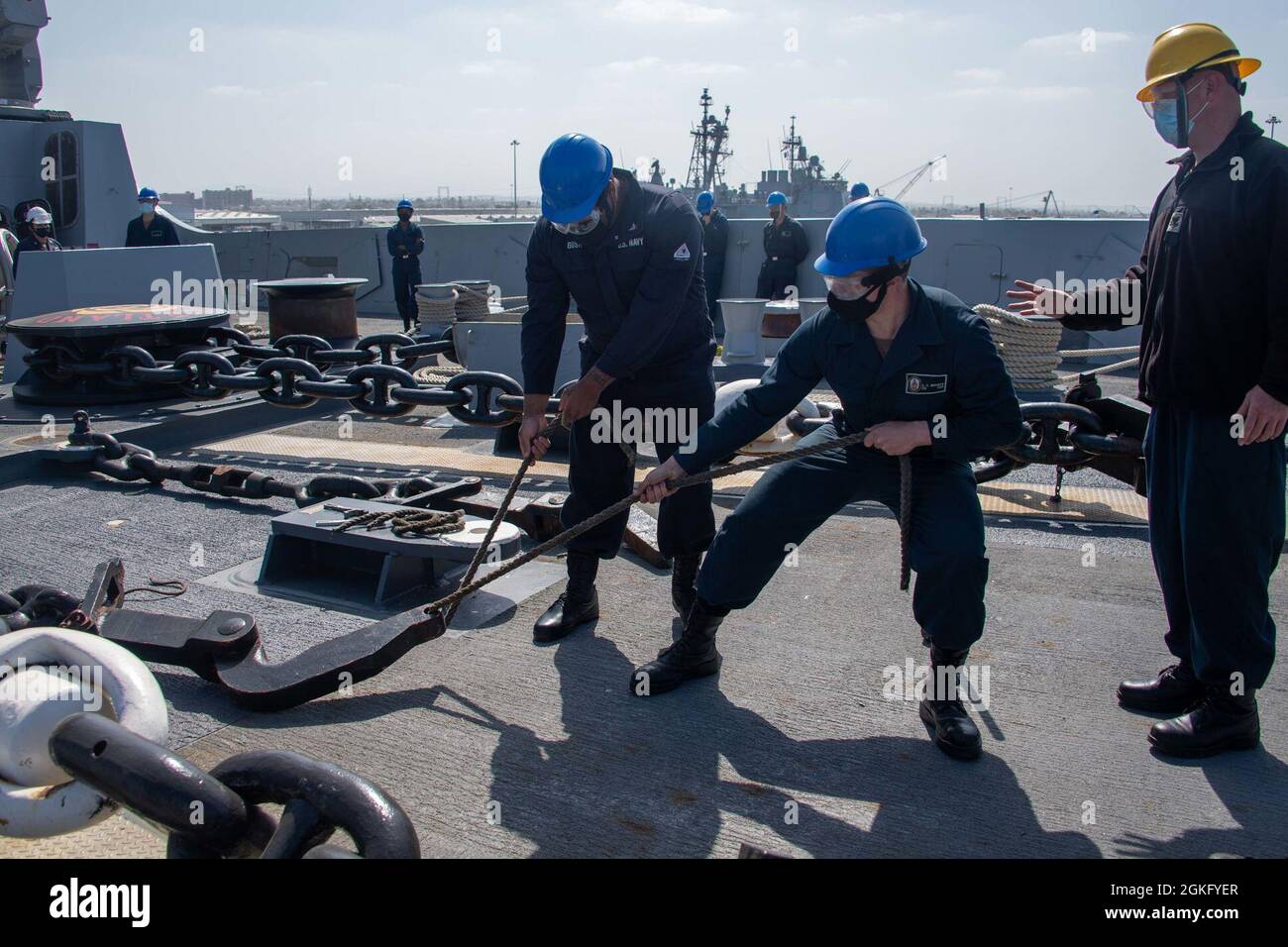 SAN DIEGO (April 12, 2021) — Sailors remove a chain stopper from the ...