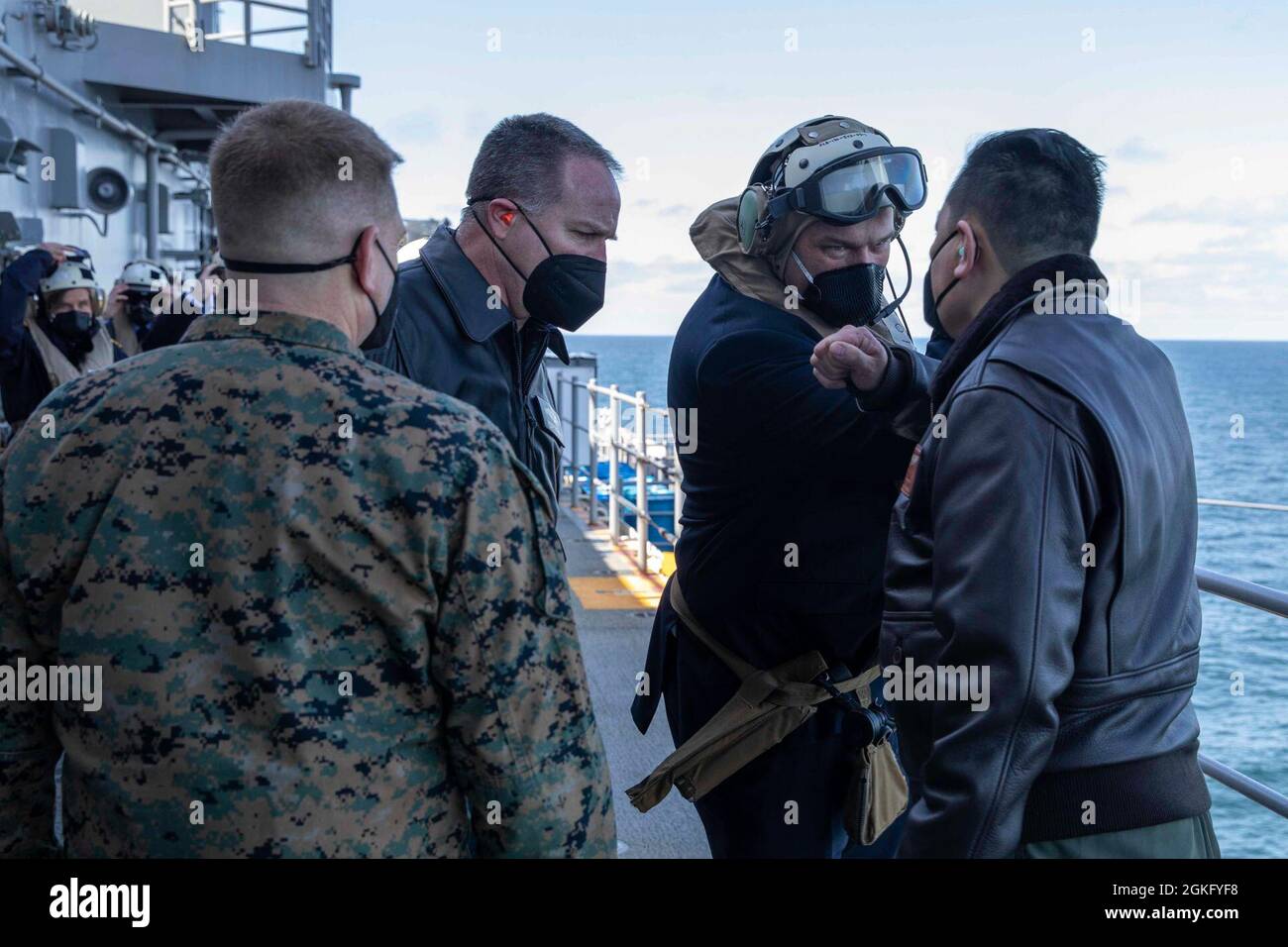 CELTIC SEA (April 12, 2021) Capt. David Loo, right, commanding officer ...