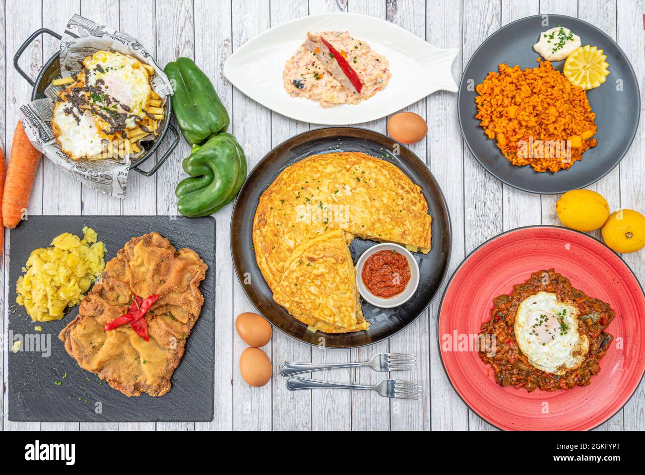 Typical dishes of traditional Spanish cuisine with cachopo, ratatouille ...