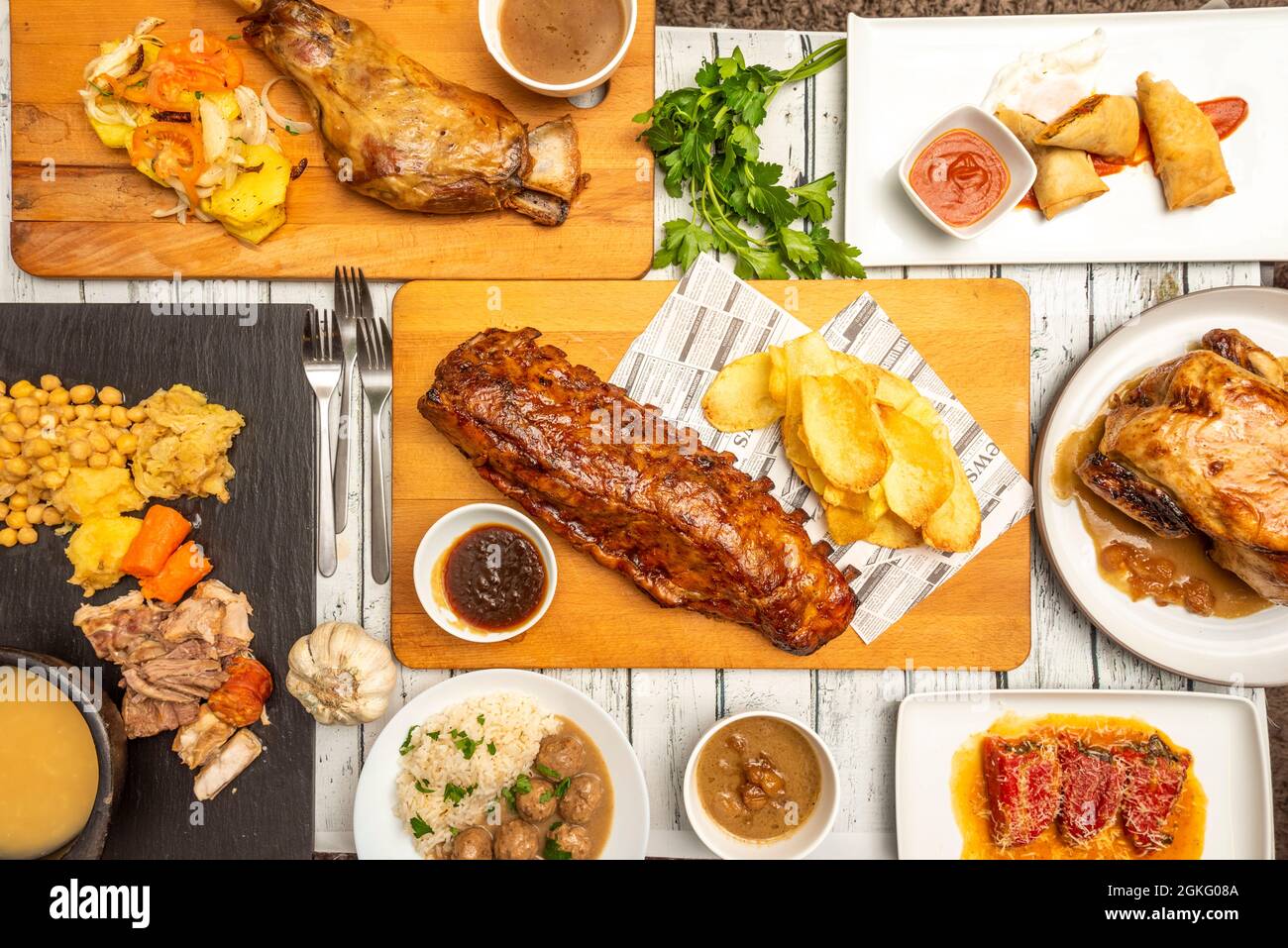 Dishes of popular Spanish food. Roast chicken, Madrid stew, meatloaf ...