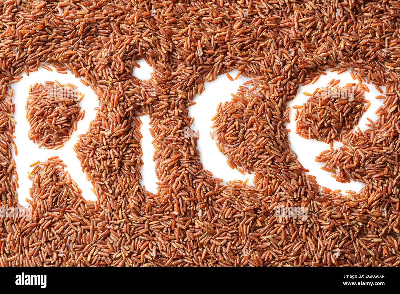 Composition with word Rice on white background Stock Photo - Alamy