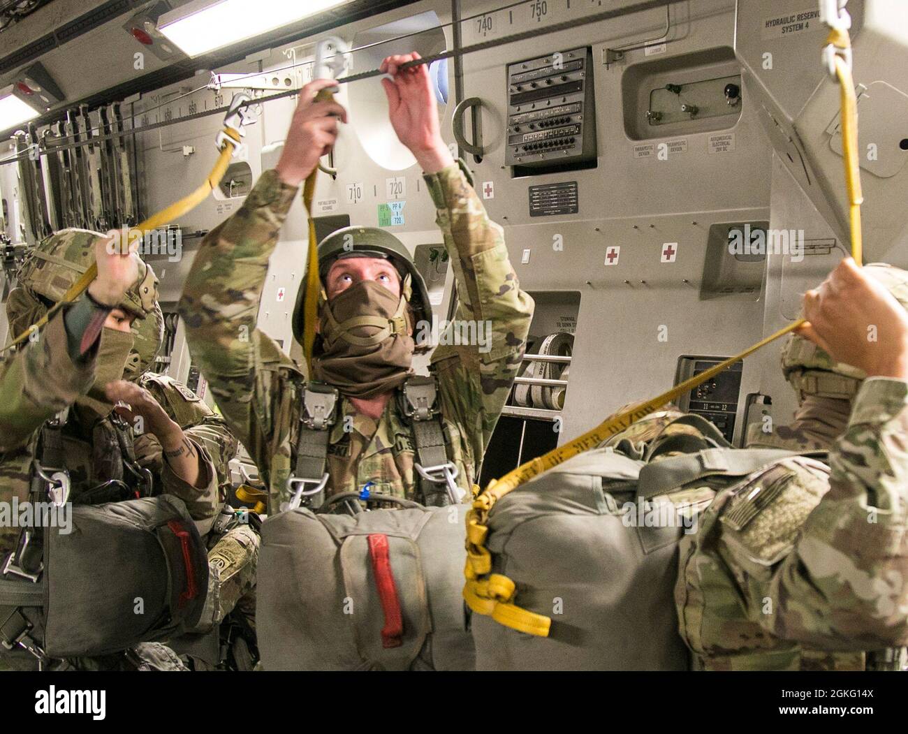 Paratroopers from the 82nd Airborne Division prepare to for their jump ...