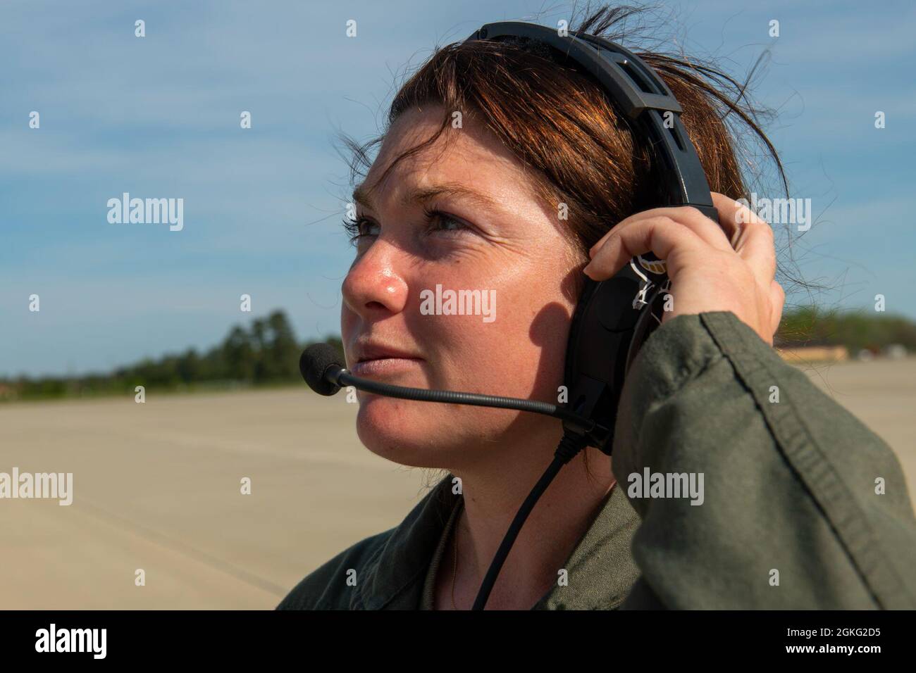 Senior Airman Grace Tinkey, a C-17 Globemaster III loadmaster assigned ...